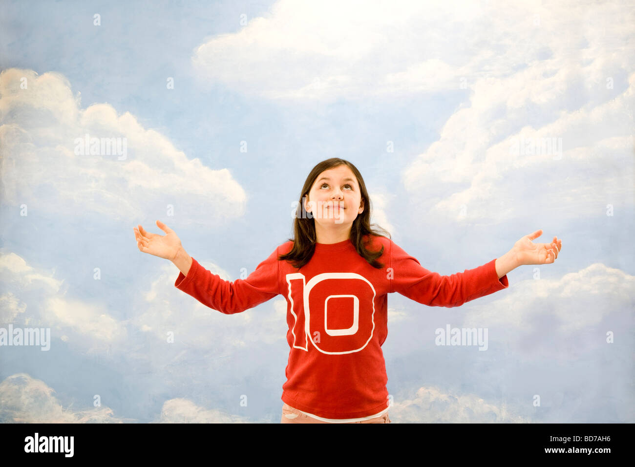 Girl with open hands Stock Photo - Alamy