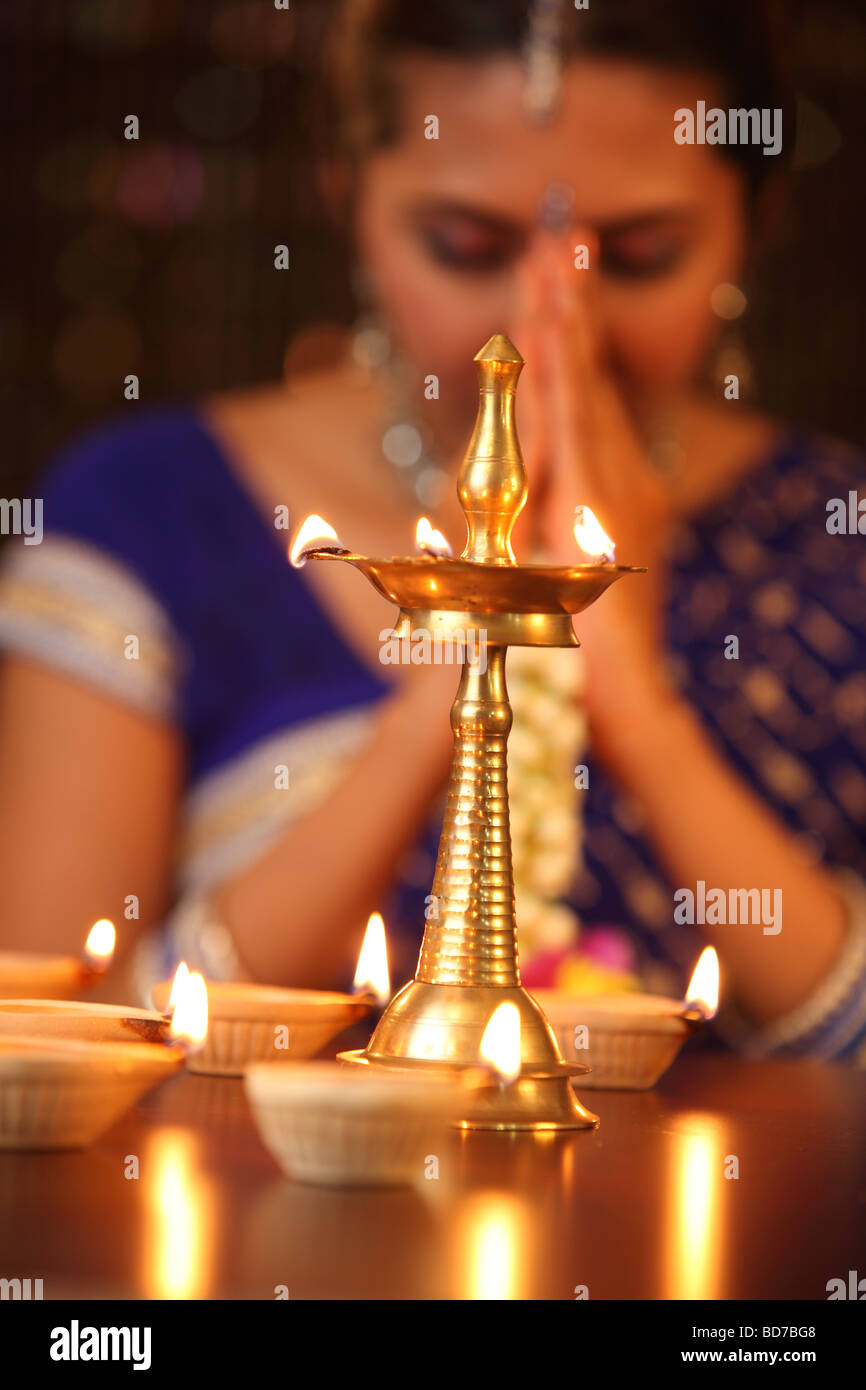 Women praying statue hindu hi-res stock photography and images - Alamy