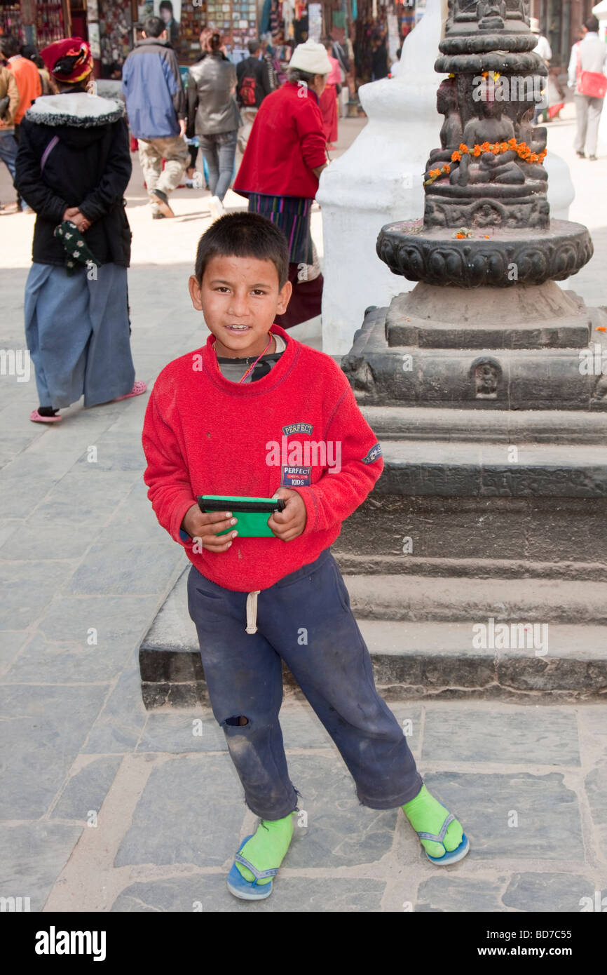 Bodhnath, Nepal. Young Nepali Boy at the Buddhist Stupa of Bodhnath ...