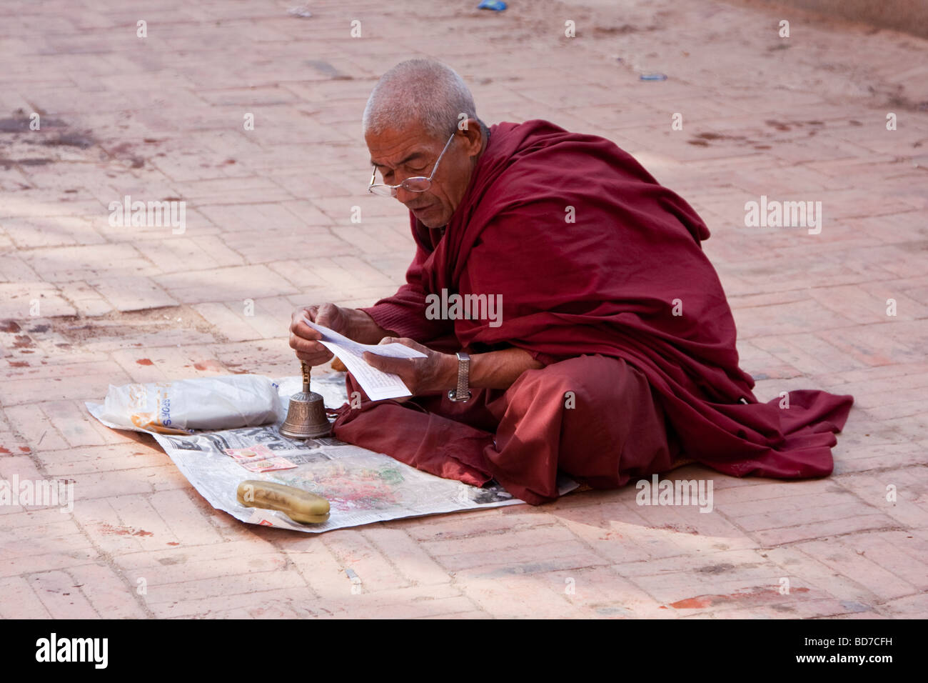Bodhnath, Nepal. A Monk Reading Holy Texts at the Buddhist Stupa of ...