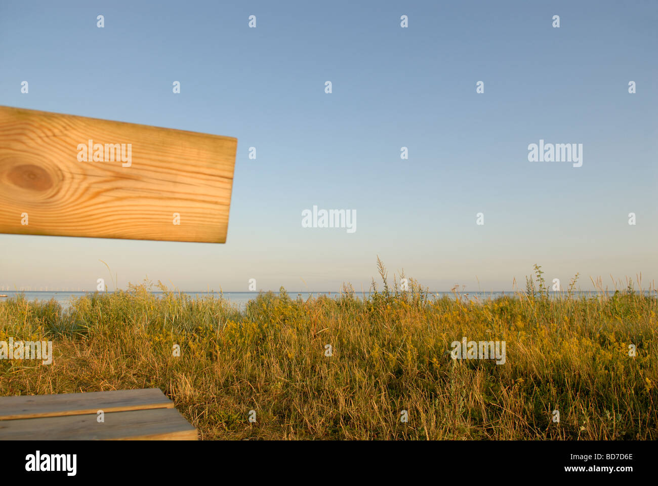 COASTAL LANDSCAPE BEHIND BENCH Stock Photo - Alamy