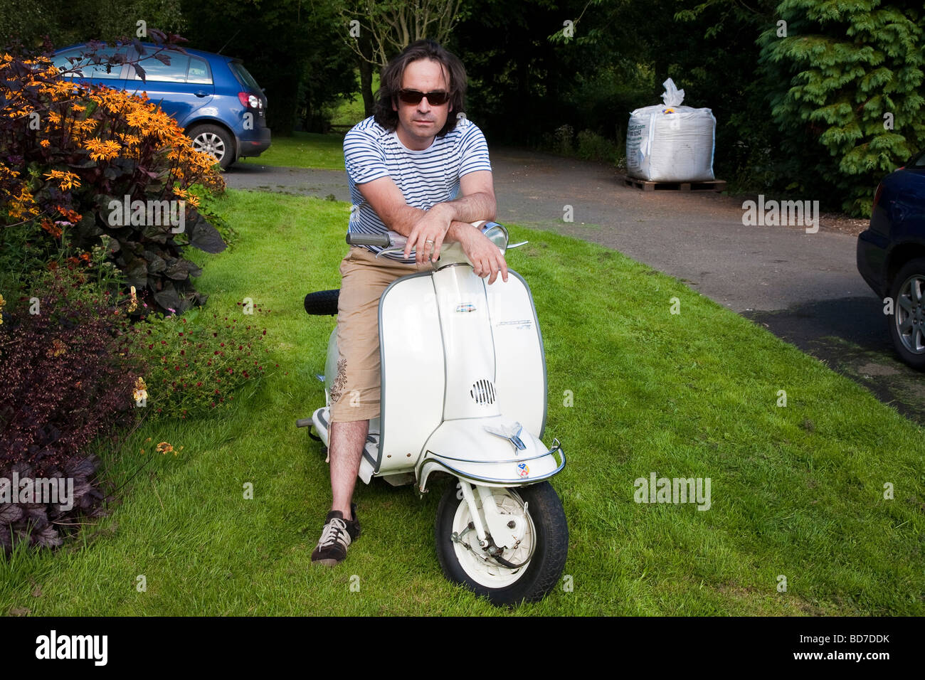 Man on Lambretta Scooter Stock Photo - Alamy
