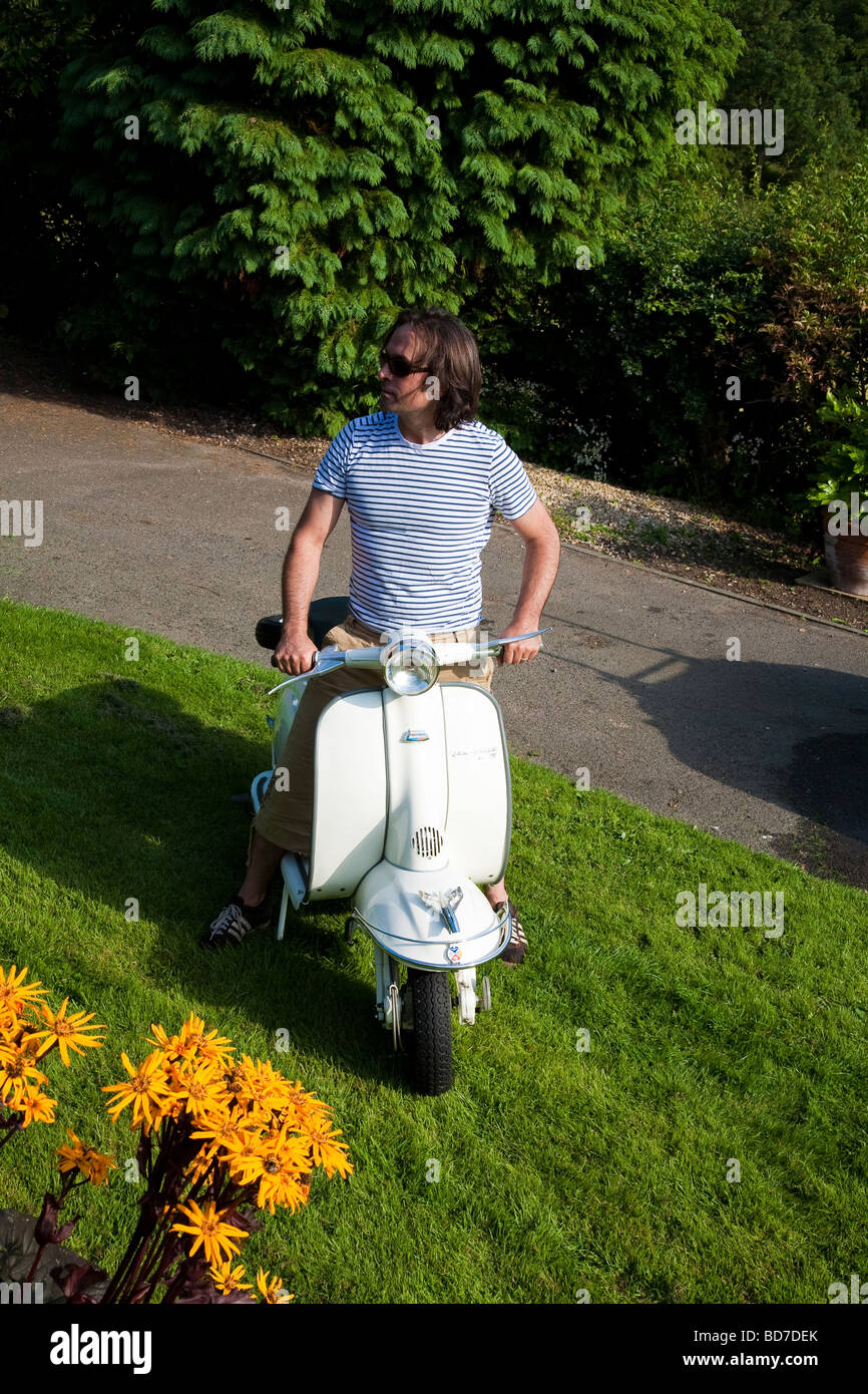Man on Lambretta Scooter Stock Photo - Alamy