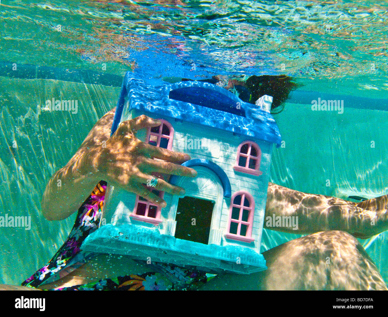 Mature woman diving swimming pool hi-res stock photography and images ...
