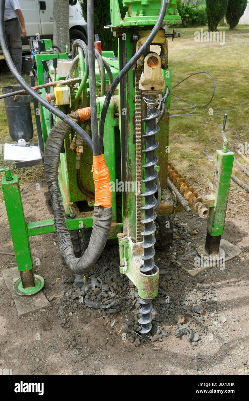 Drill machine for ground analysis in action Stock Photo - Alamy