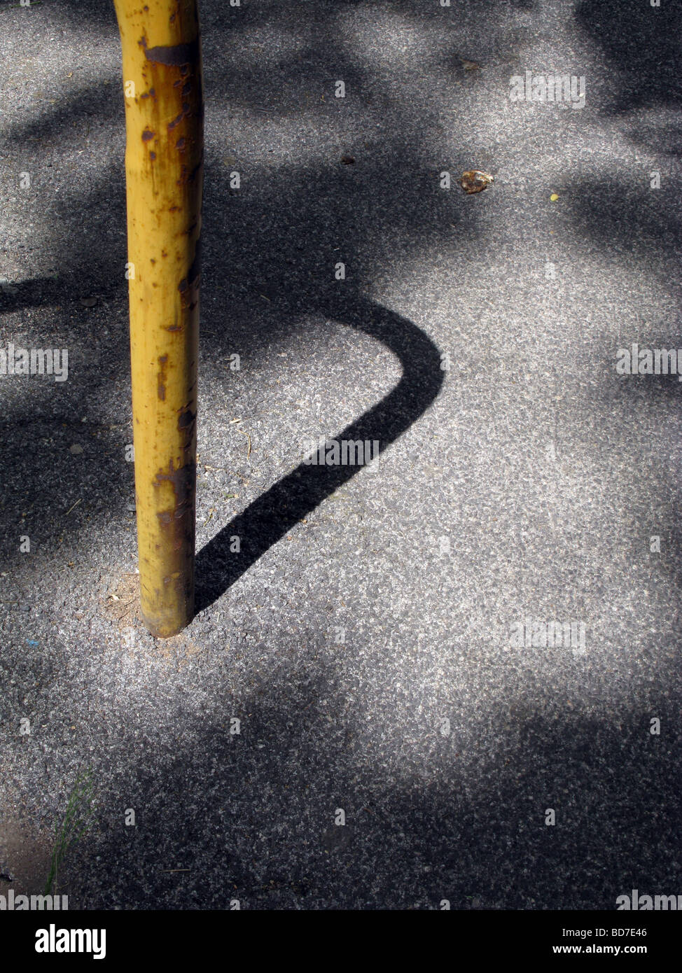 barrier shadow on street road in sun Stock Photo - Alamy