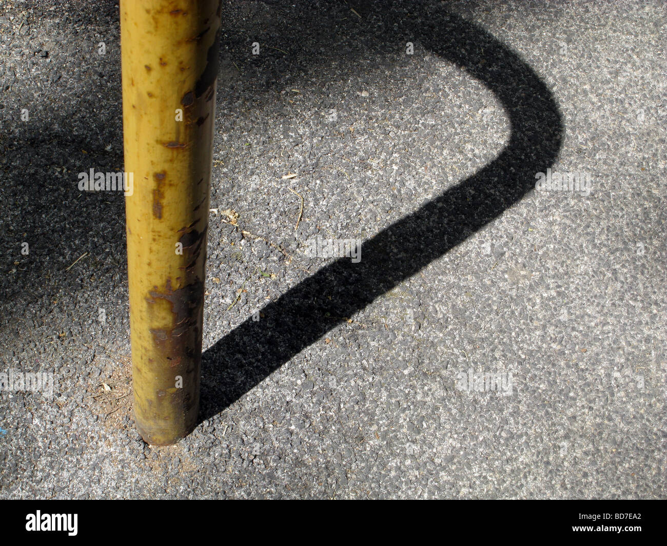 barrier shadow on street road in sun Stock Photo - Alamy