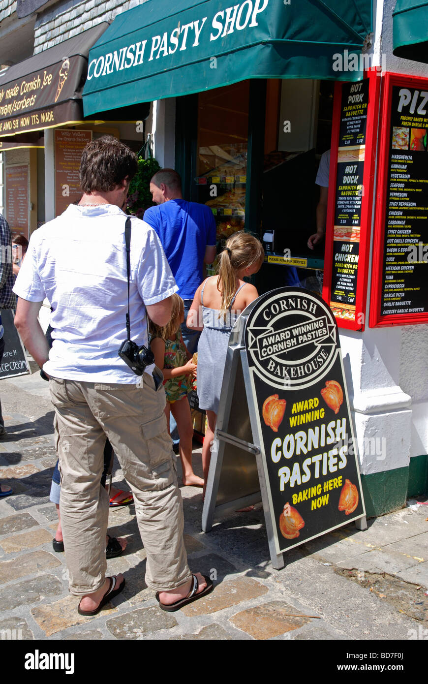 Queuing outside shop waiting hi-res stock photography and images - Alamy