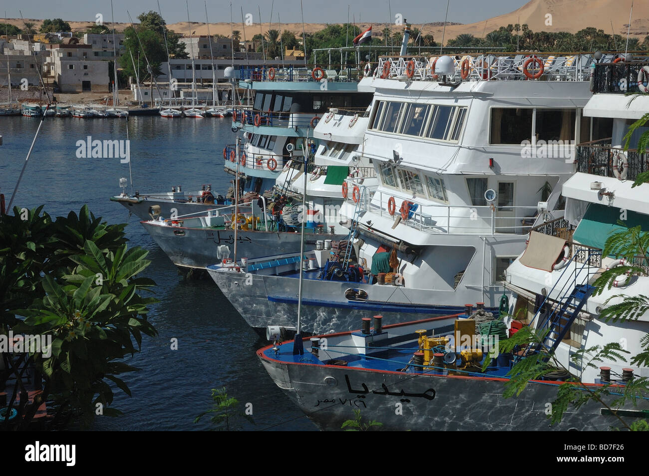 Nile cruiser vessels docked in the Nile River in Aswan southern Egypt ...