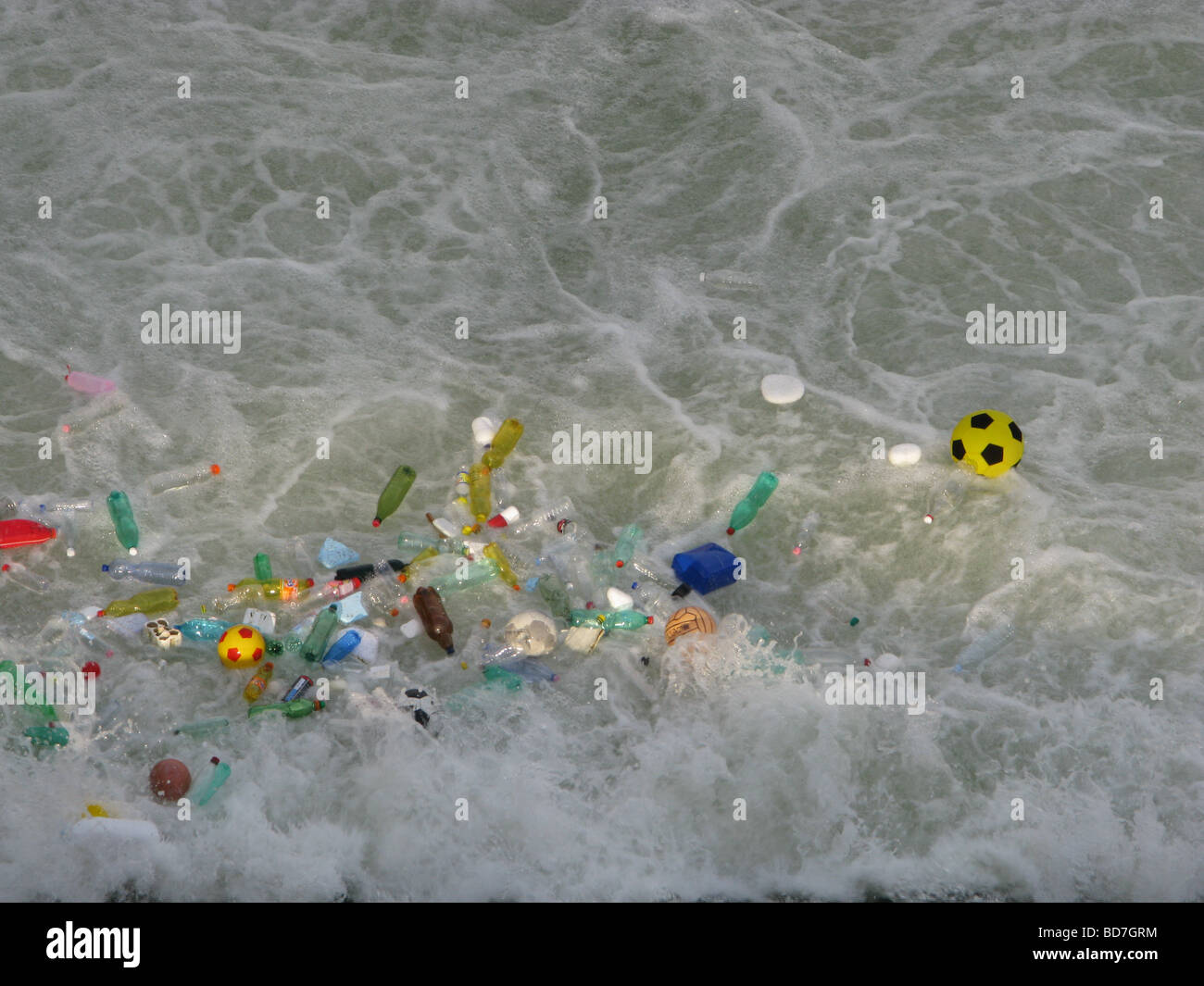 rubbish floating in river waterfall Stock Photo - Alamy