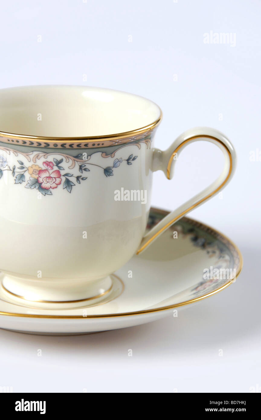 Close Up of Fine China Cup and Saucer over a white background Stock ...