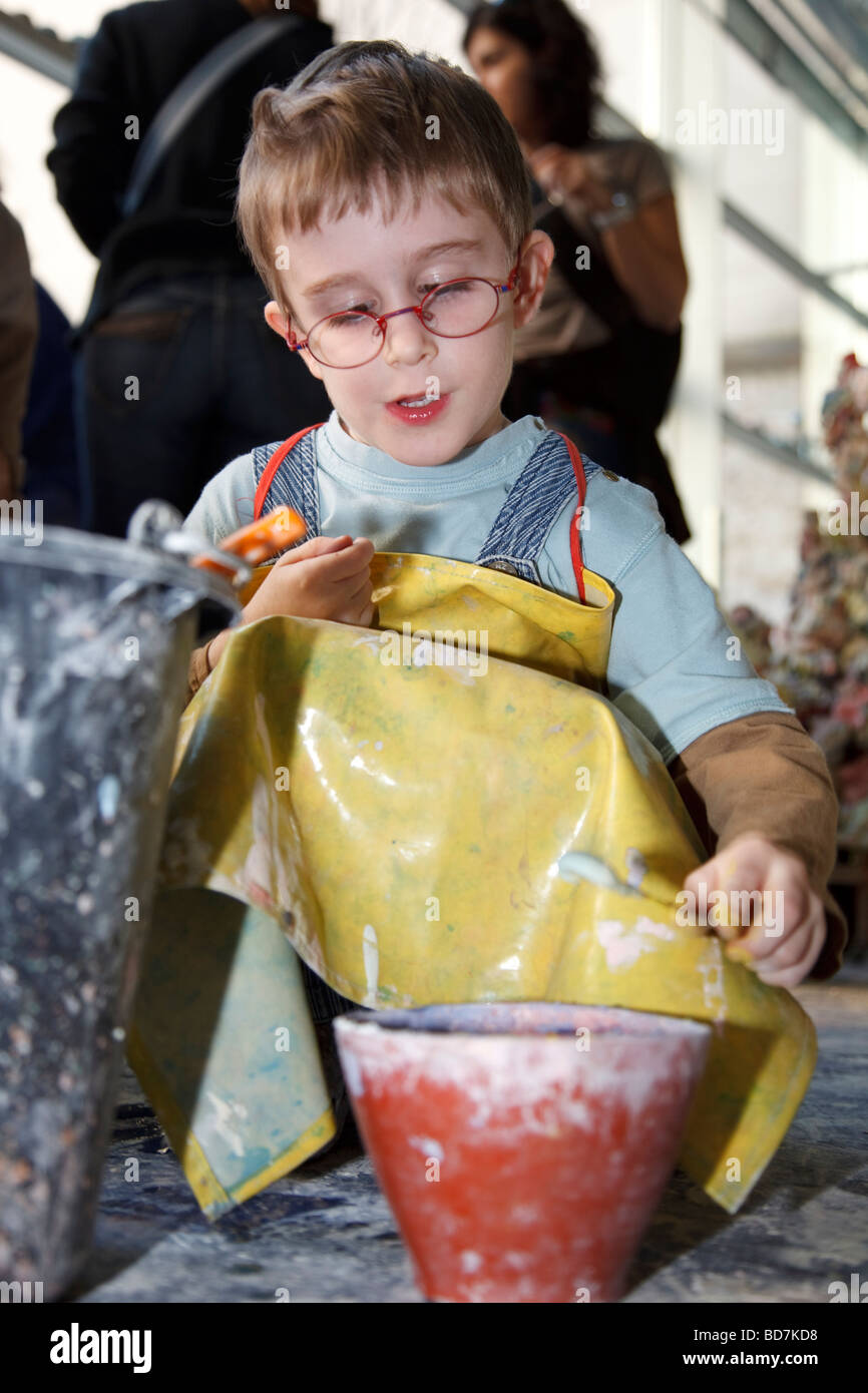 little boy working in studio Stock Photo - Alamy