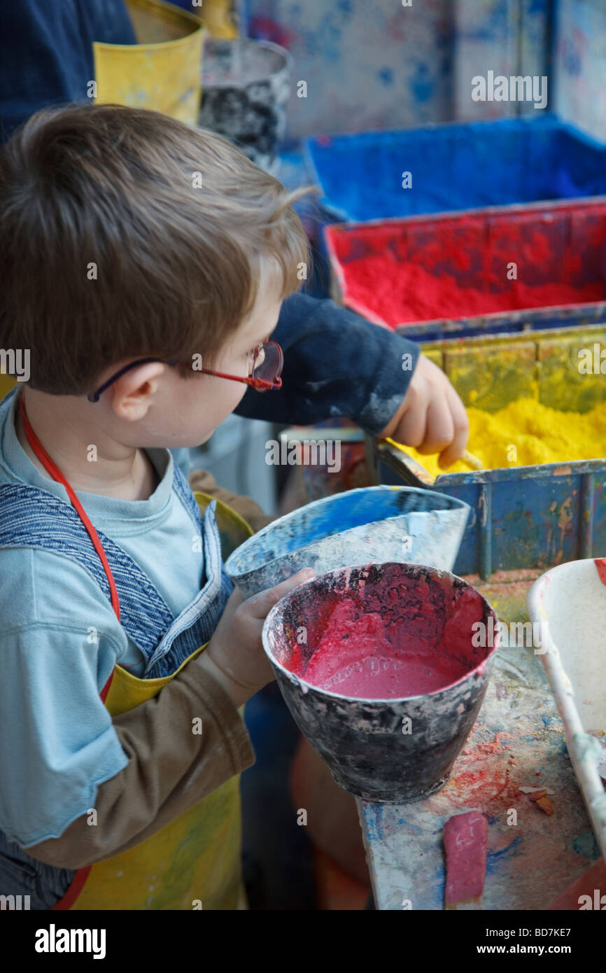 little boy working in studio Stock Photo - Alamy