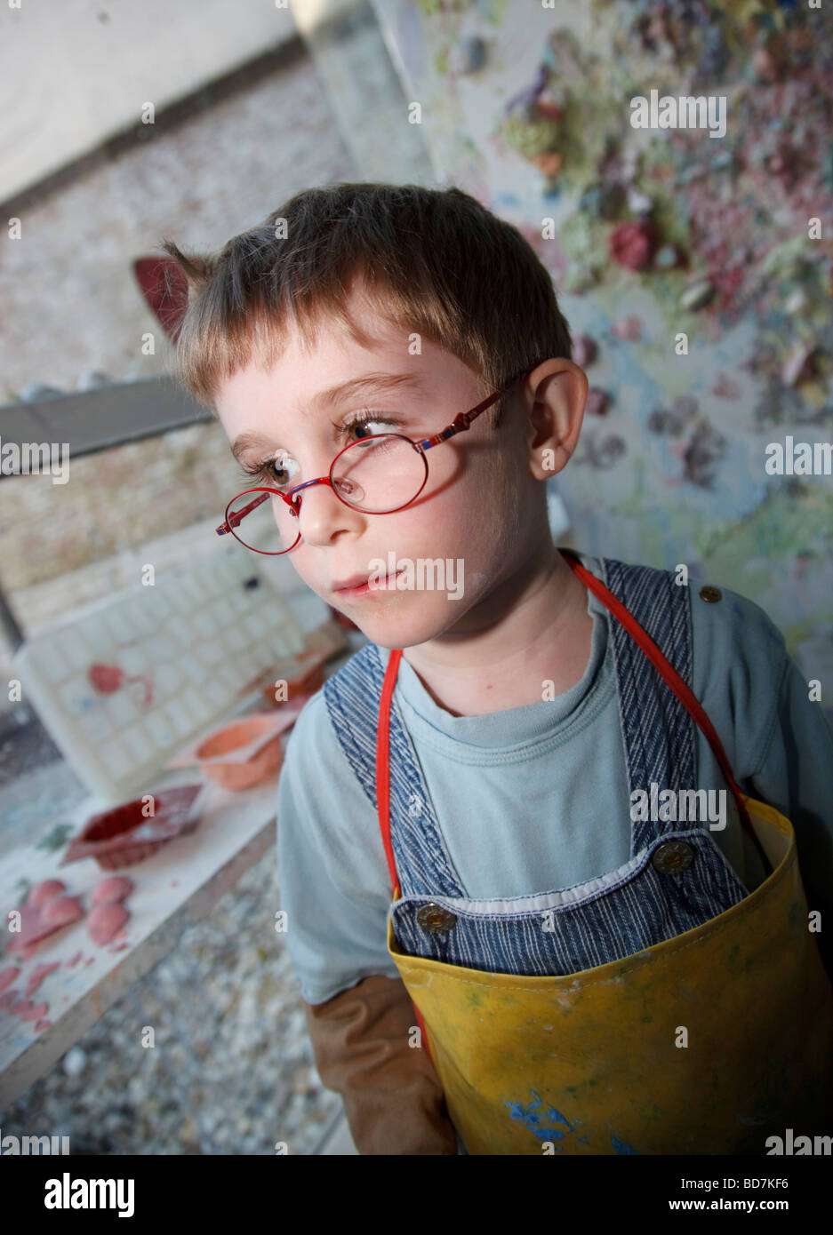 little boy working in studio Stock Photo - Alamy
