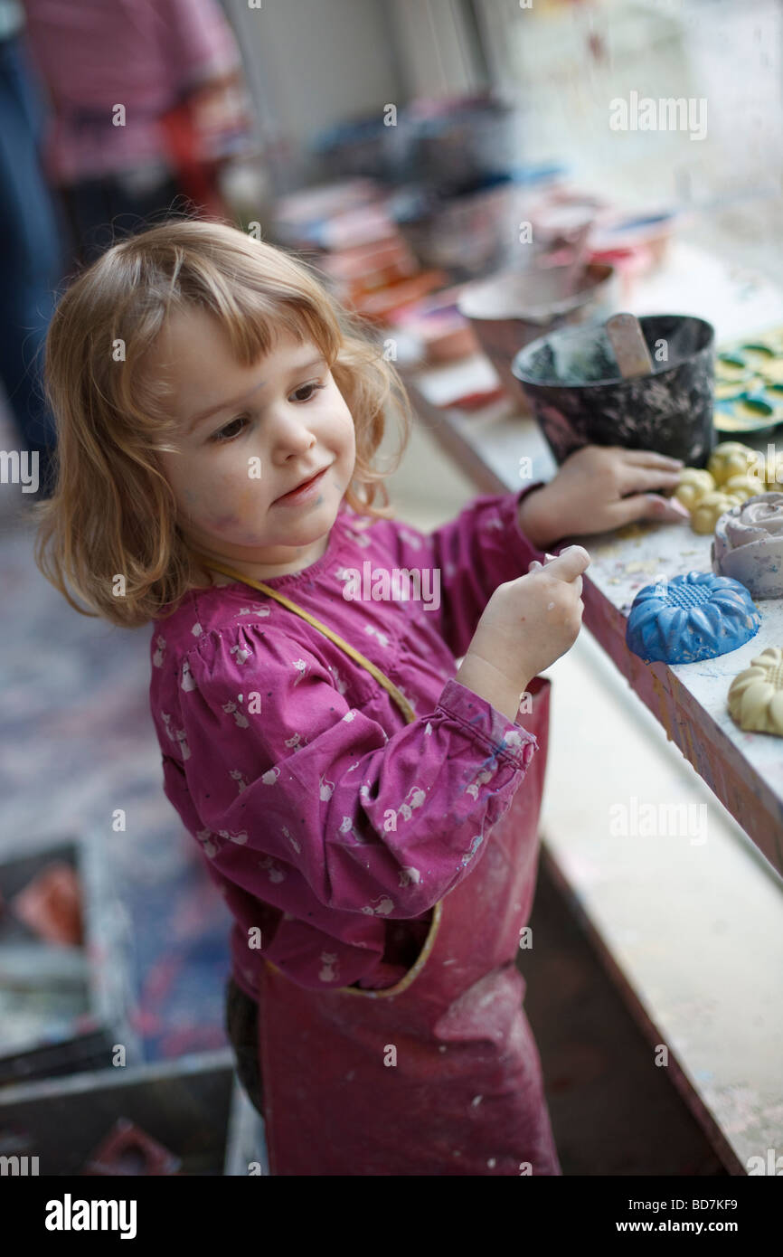 little girl working in studio Stock Photo - Alamy