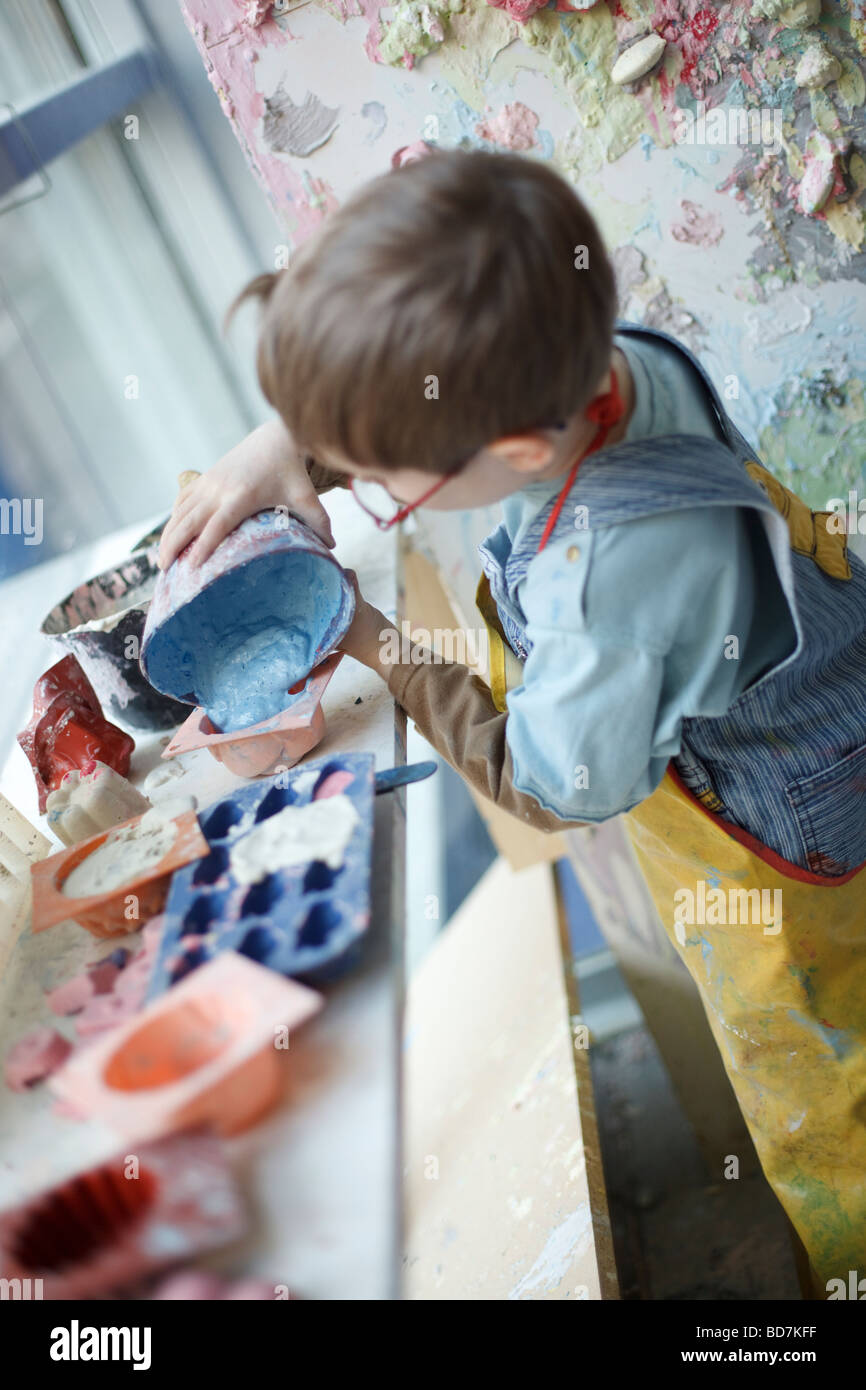 little boy working in studio Stock Photo - Alamy