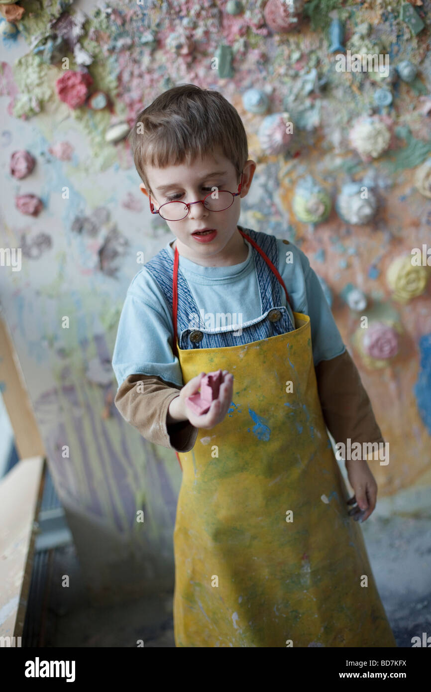 little boy working in studio Stock Photo - Alamy