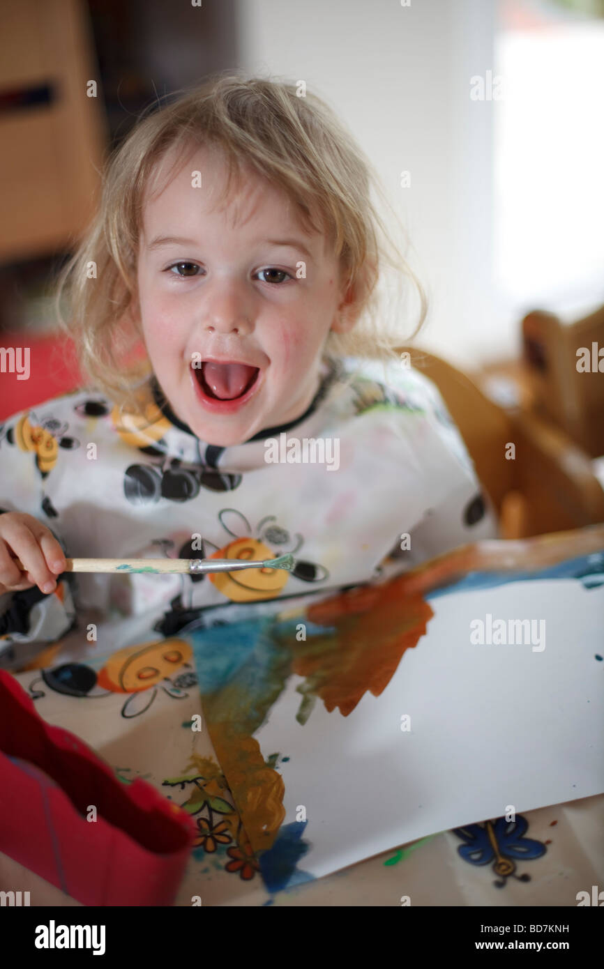 girl painting with watercolors Stock Photo - Alamy