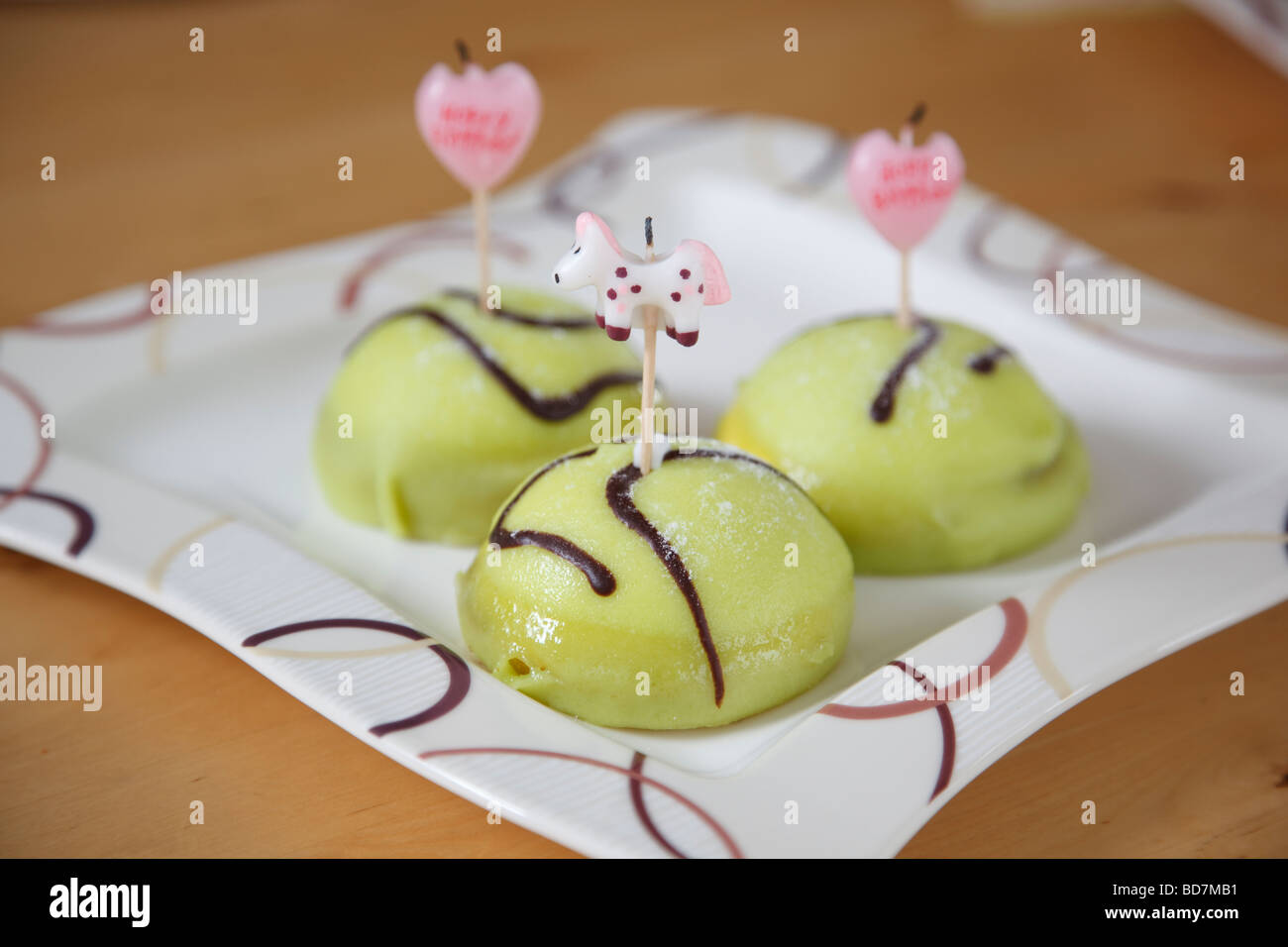 three small cakes Stock Photo - Alamy