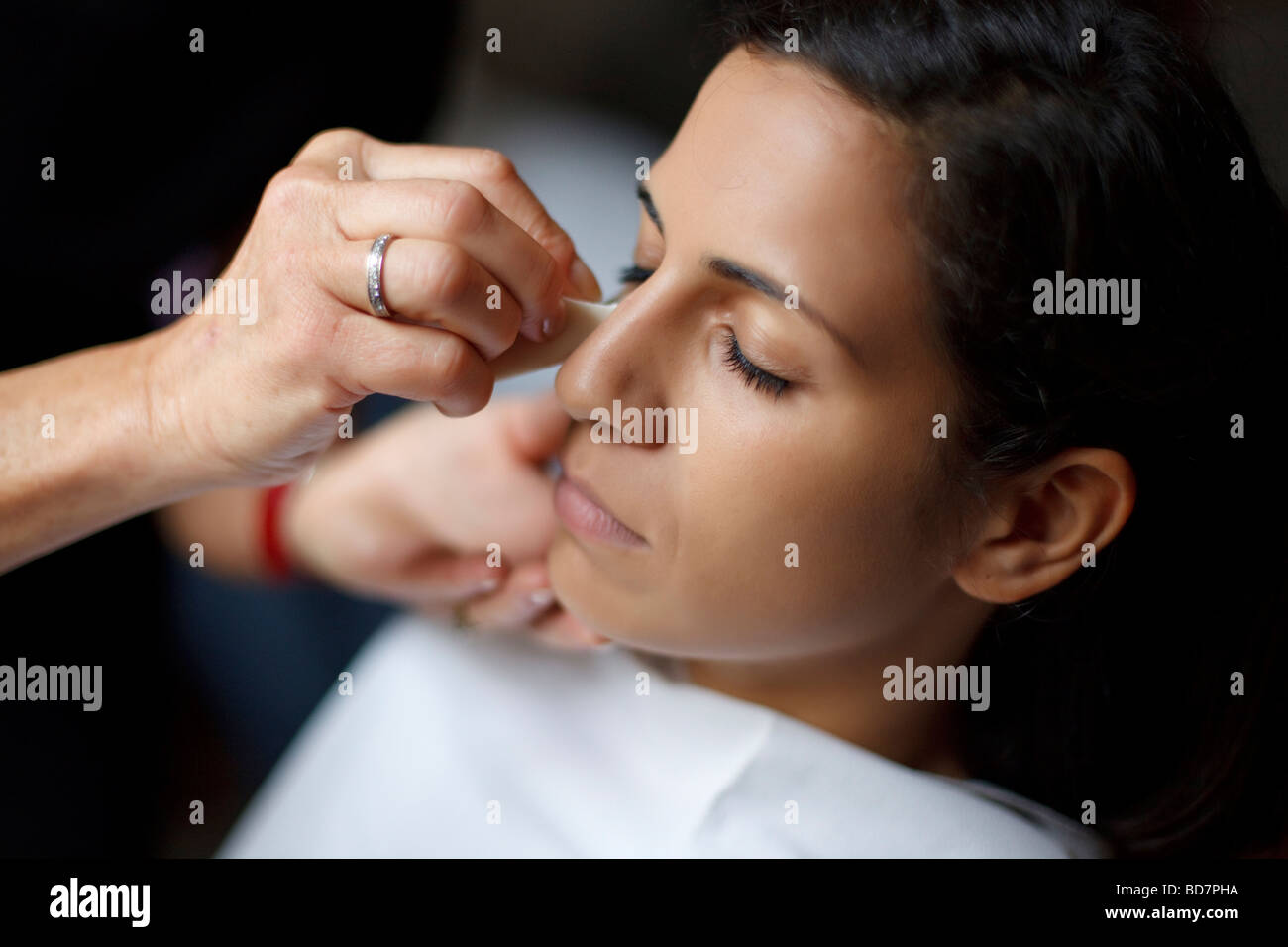 woman getting her make up done Stock Photo - Alamy