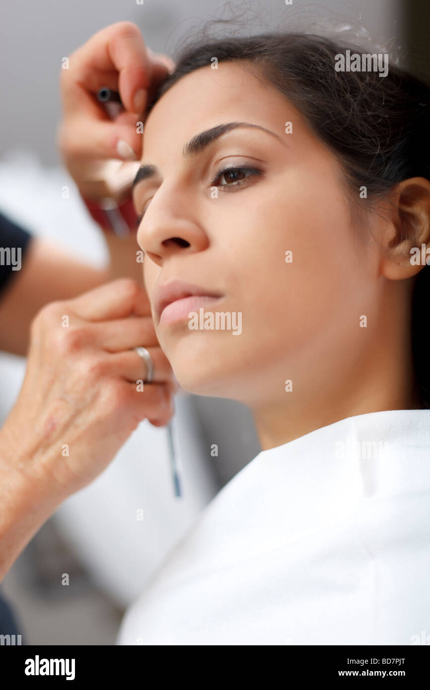 woman getting her make up done Stock Photo - Alamy