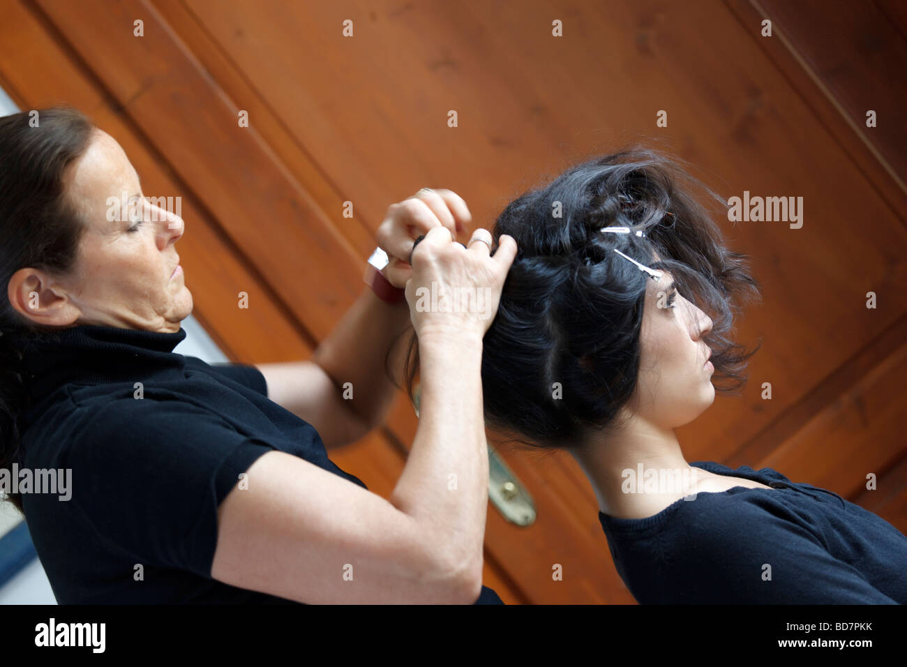young woman getting a new hairstyle Stock Photo - Alamy