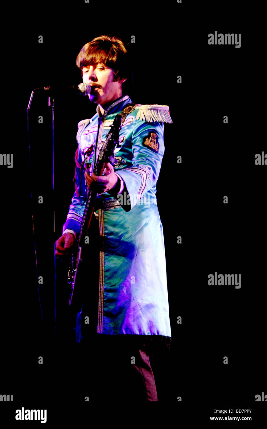 The Bootleg Beatles tribute band in concert Stock Photo - Alamy