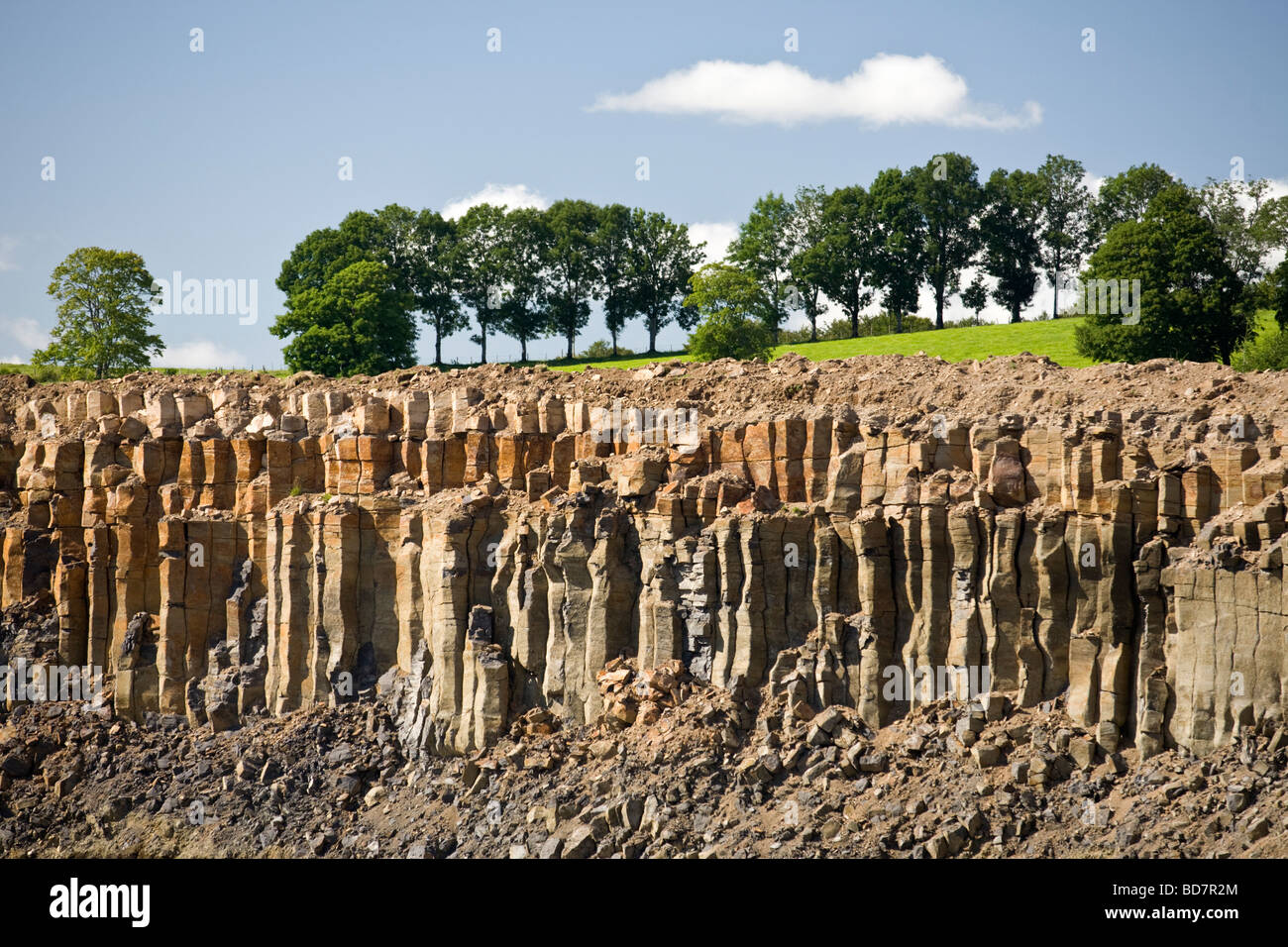 A quarry with basalt columns at Chastreix (Puy de Dôme - France). A ...