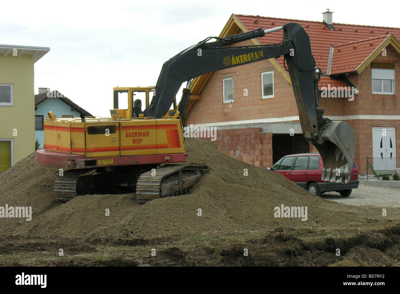 digger digging cunstruction trench Stock Photo - Alamy