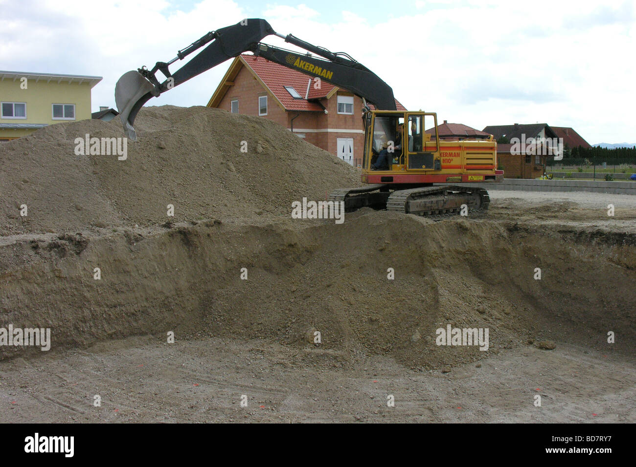 digger digging cunstruction trench Stock Photo - Alamy