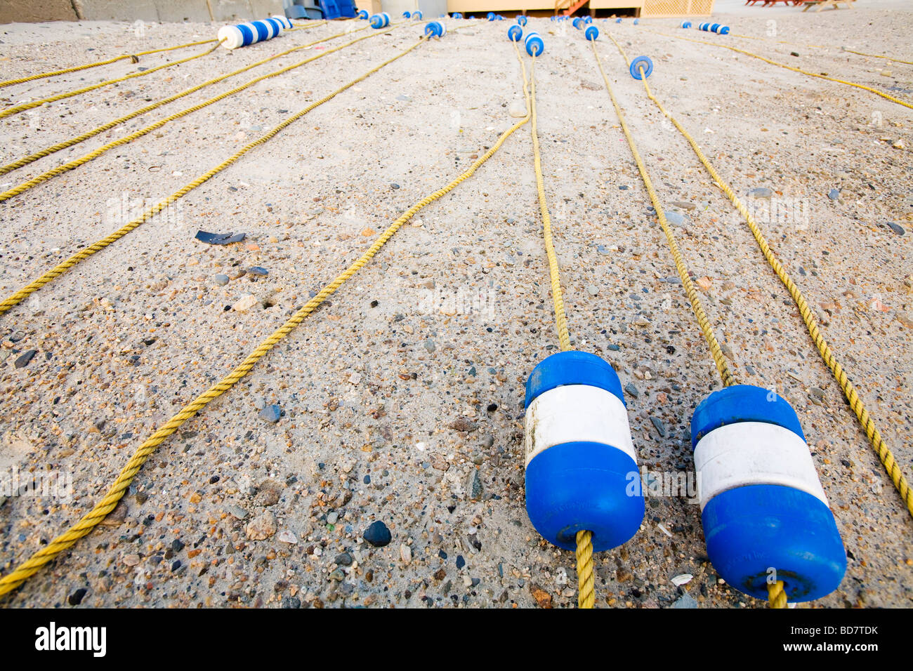 Plastic floats laid out waiting to be put in the water to create safe ...