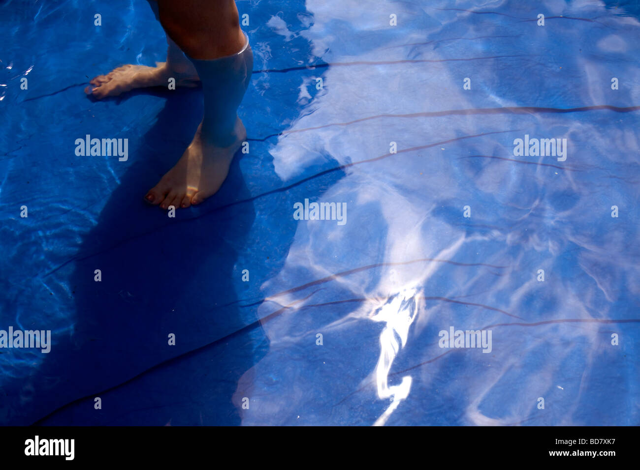 Paddling in paddling pool Stock Photo - Alamy