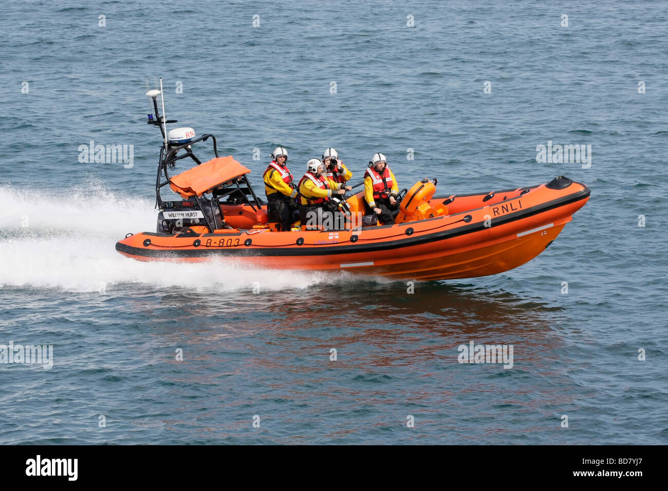 The Sheringham Atlantic 85 RIB lifeboat steams in to action Stock Photo ...