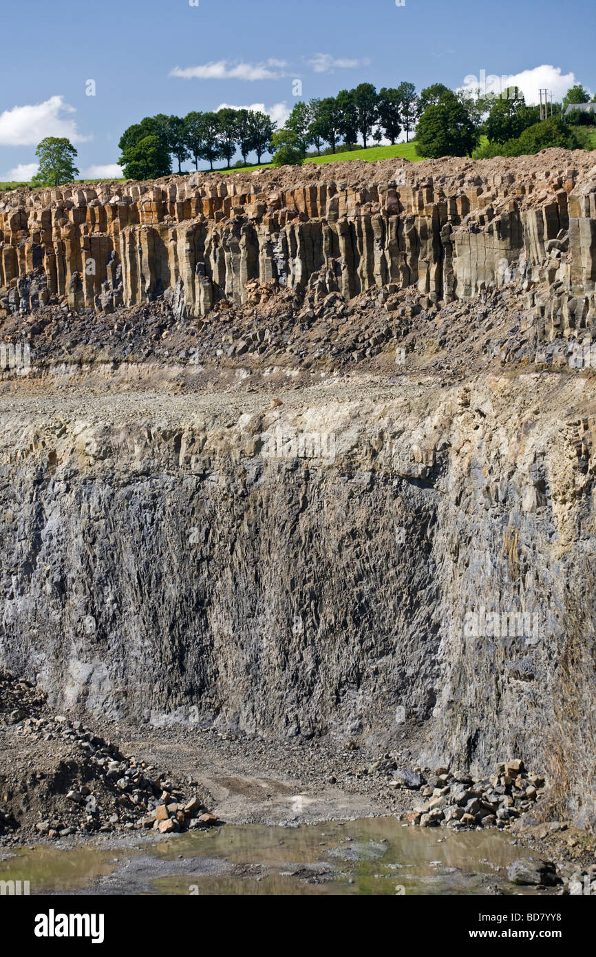 A quarry with basalt columns at Chastreix (Puy de Dôme - France). A ...