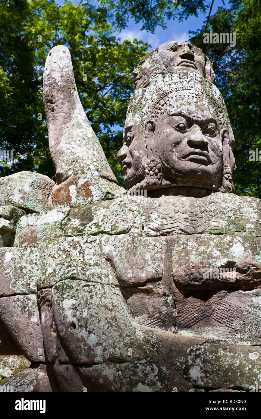 A stone guardian at the end of a bridge over the massive enclosing ...