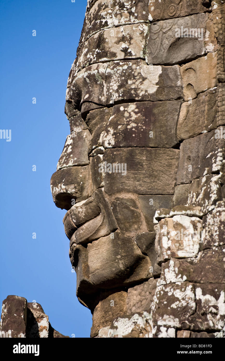 Enormous carved stone face above a gate at Bantey Kdei near Angkor Wat ...