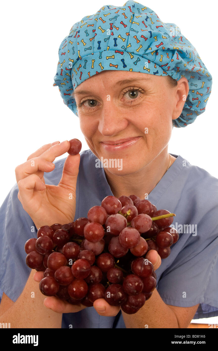 doctor nurse lady female food fruit grapes grape bunch group smiling ...