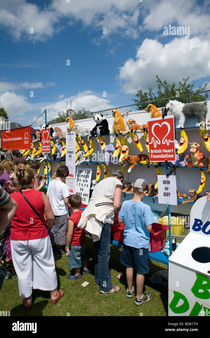 Stands at a village fete on a summers day in rural England Stock Photo ...