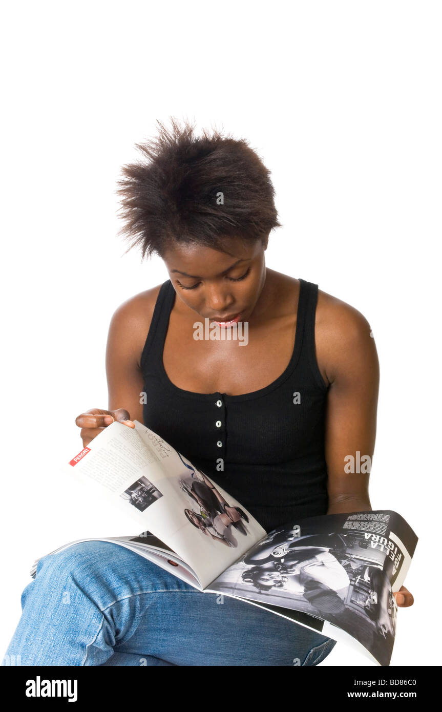Woman flicking through magazine hi-res stock photography and images - Alamy