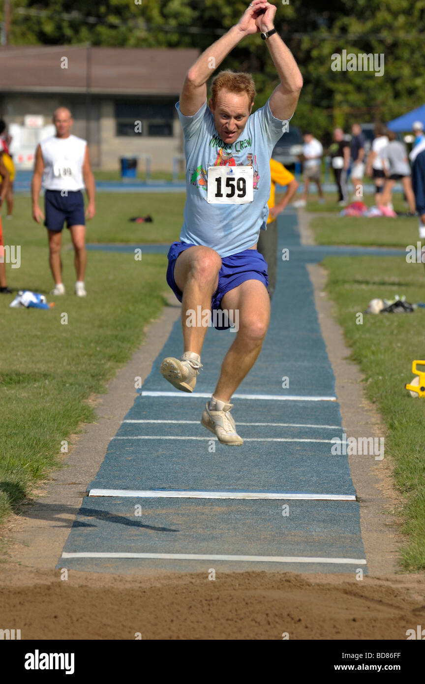 Man long jump track hi-res stock photography and images - Alamy