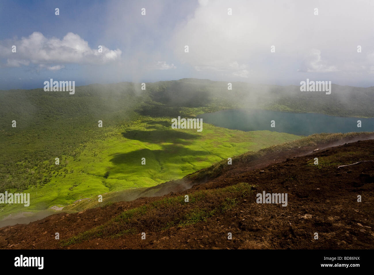 View over a vivid green area near Mount Garet with Lake Letas and the ...