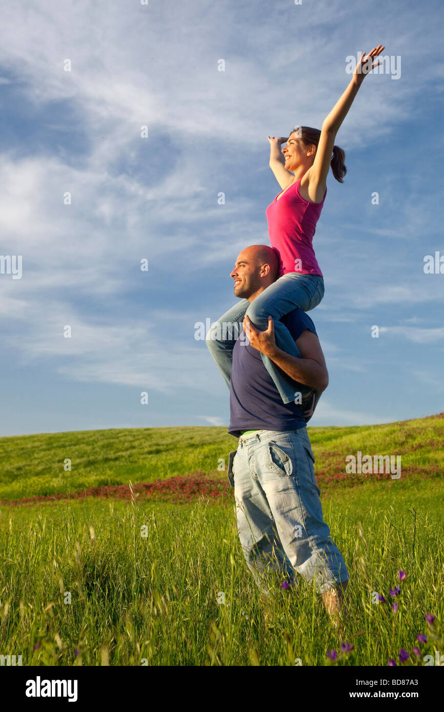 Young couple having good time on a beautiful springfield Stock Photo ...