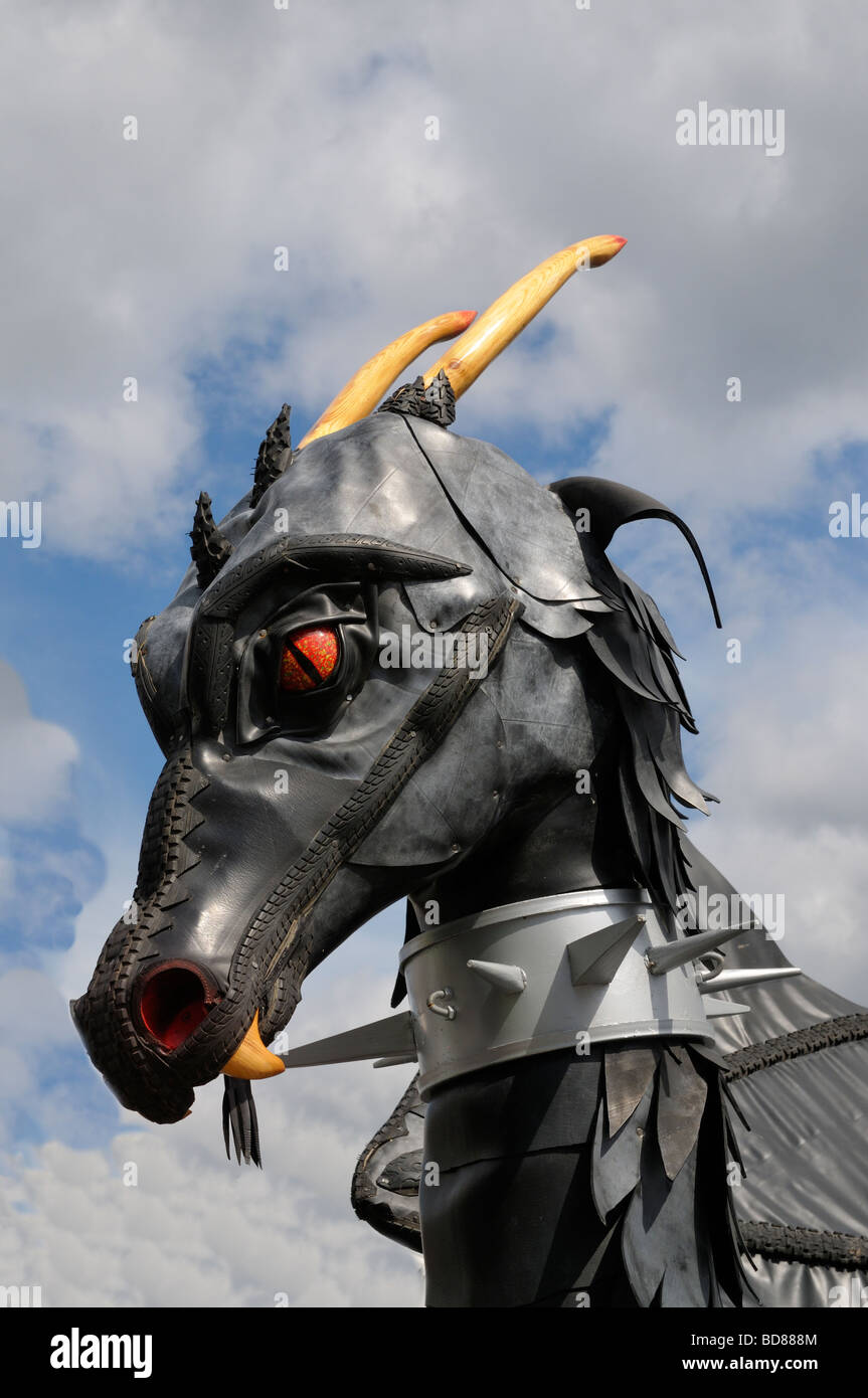 Head of dragon sculpted from recycled tyre rubber Stock Photo - Alamy