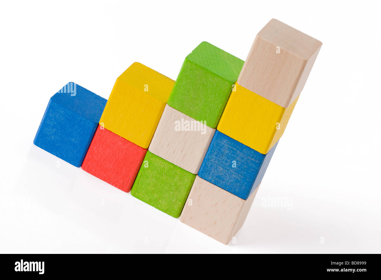 Wooden toy blocks on white background Stock Photo - Alamy