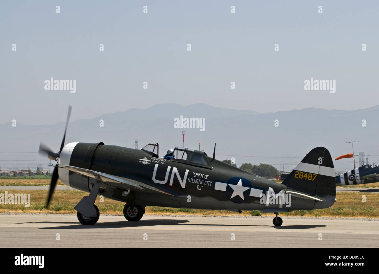 A Republic P-47G Thunderbolt taxis on the runway after flying at an air ...
