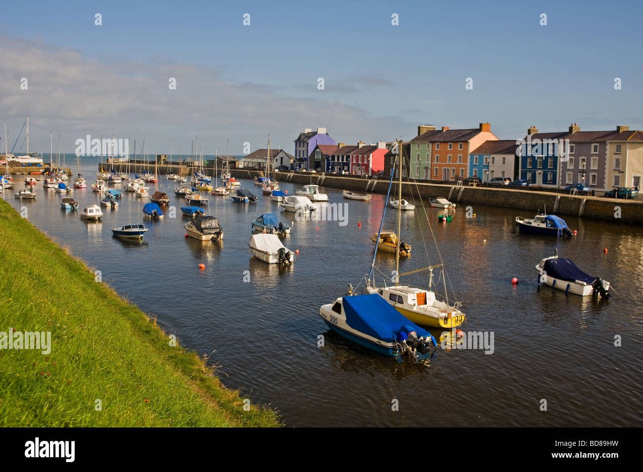 Aberaeron Harbour on the south side looking west out to sea on a fine ...
