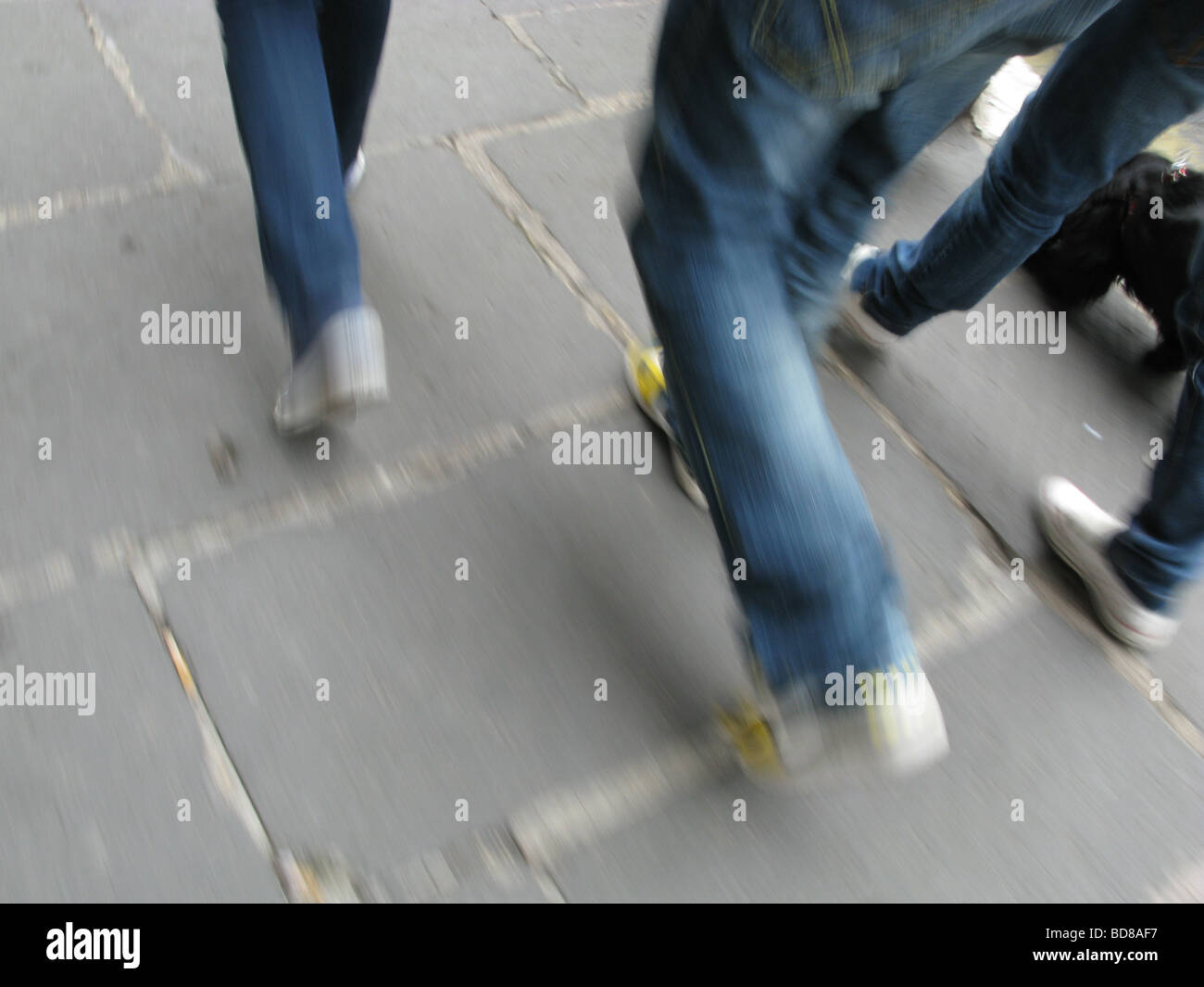 group young people in denim jeans walking in town Stock Photo - Alamy