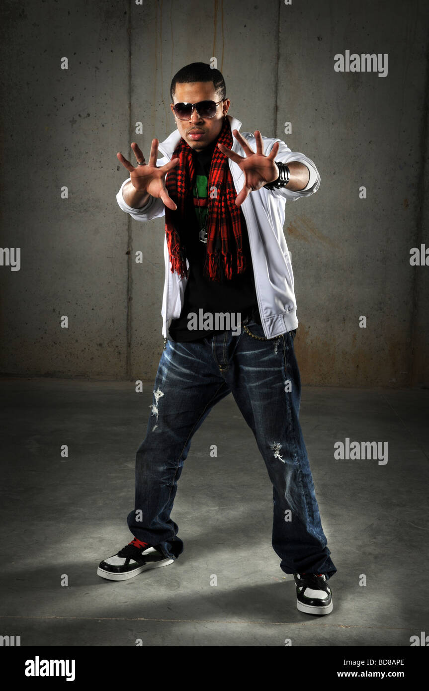 African American hip hop dancer extending hands Stock Photo - Alamy