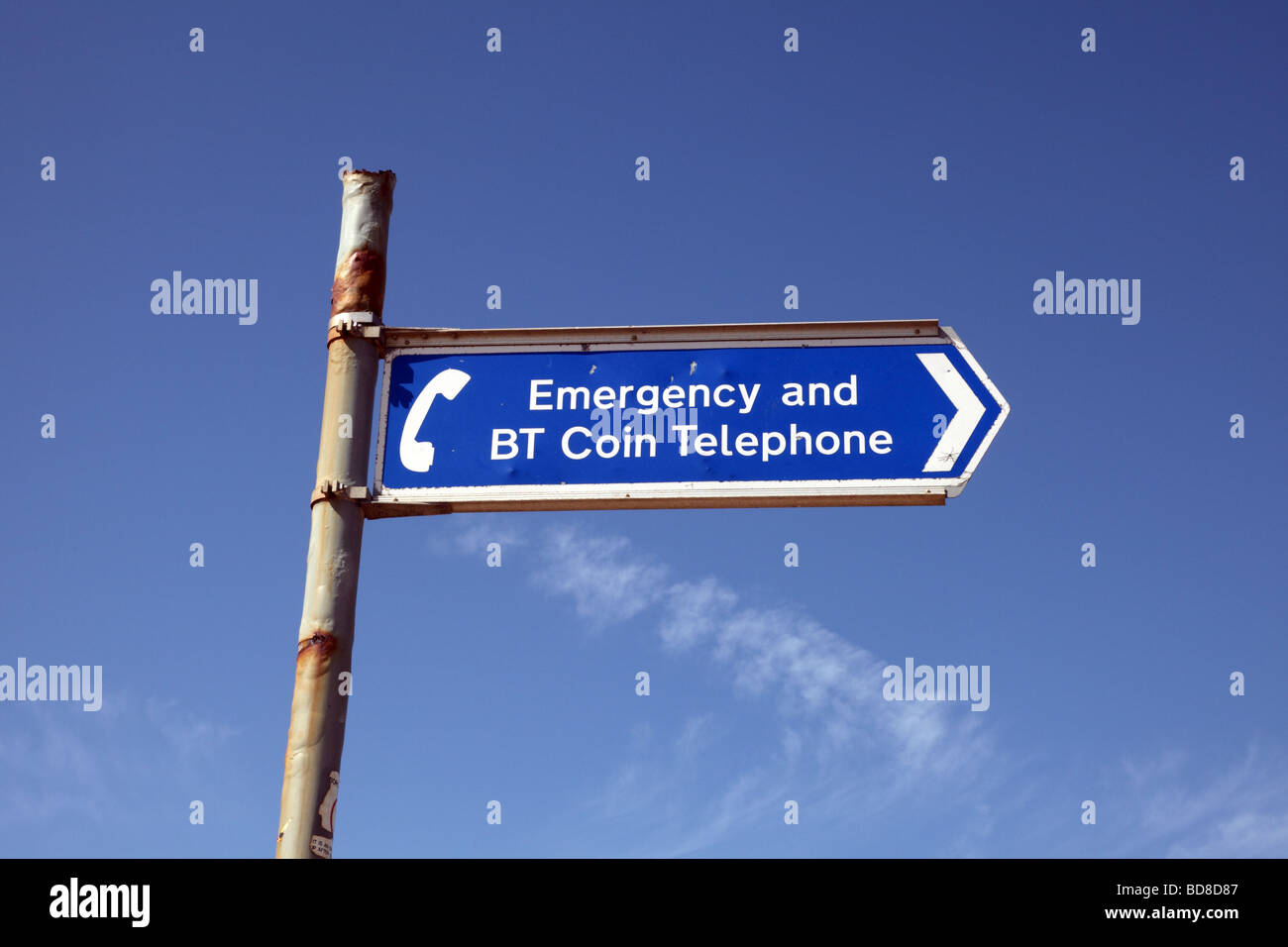 Emergency and BT Coin Telephone sign on the beach at Hayling Island ...