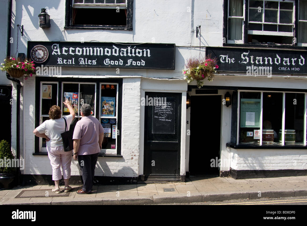 old ancient listed building shop visitors summer Rye town centre east ...